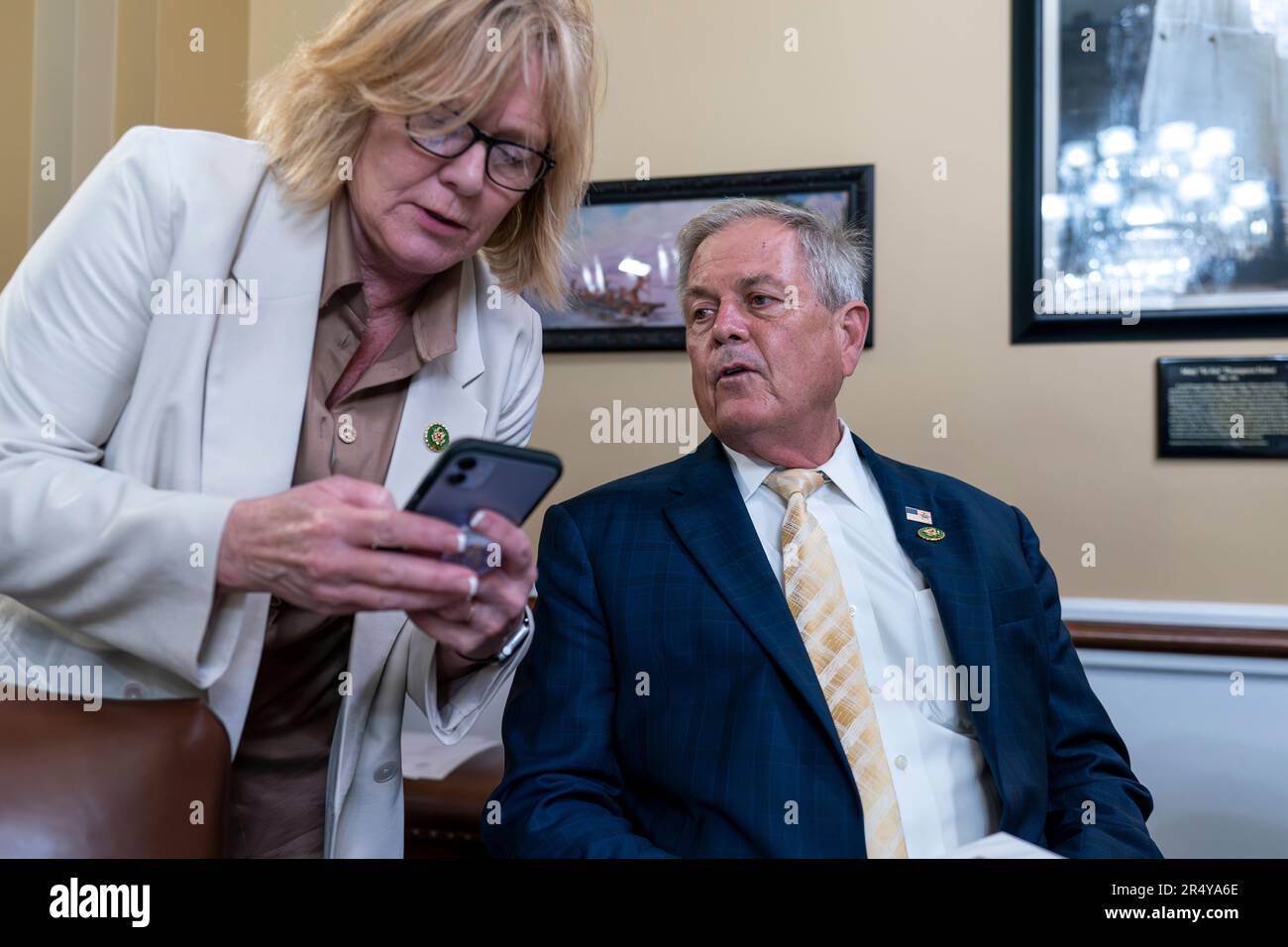 Rep. Michelle Fischbach, R-Minn., left, talks with Rep. Ralph Norman, R ...