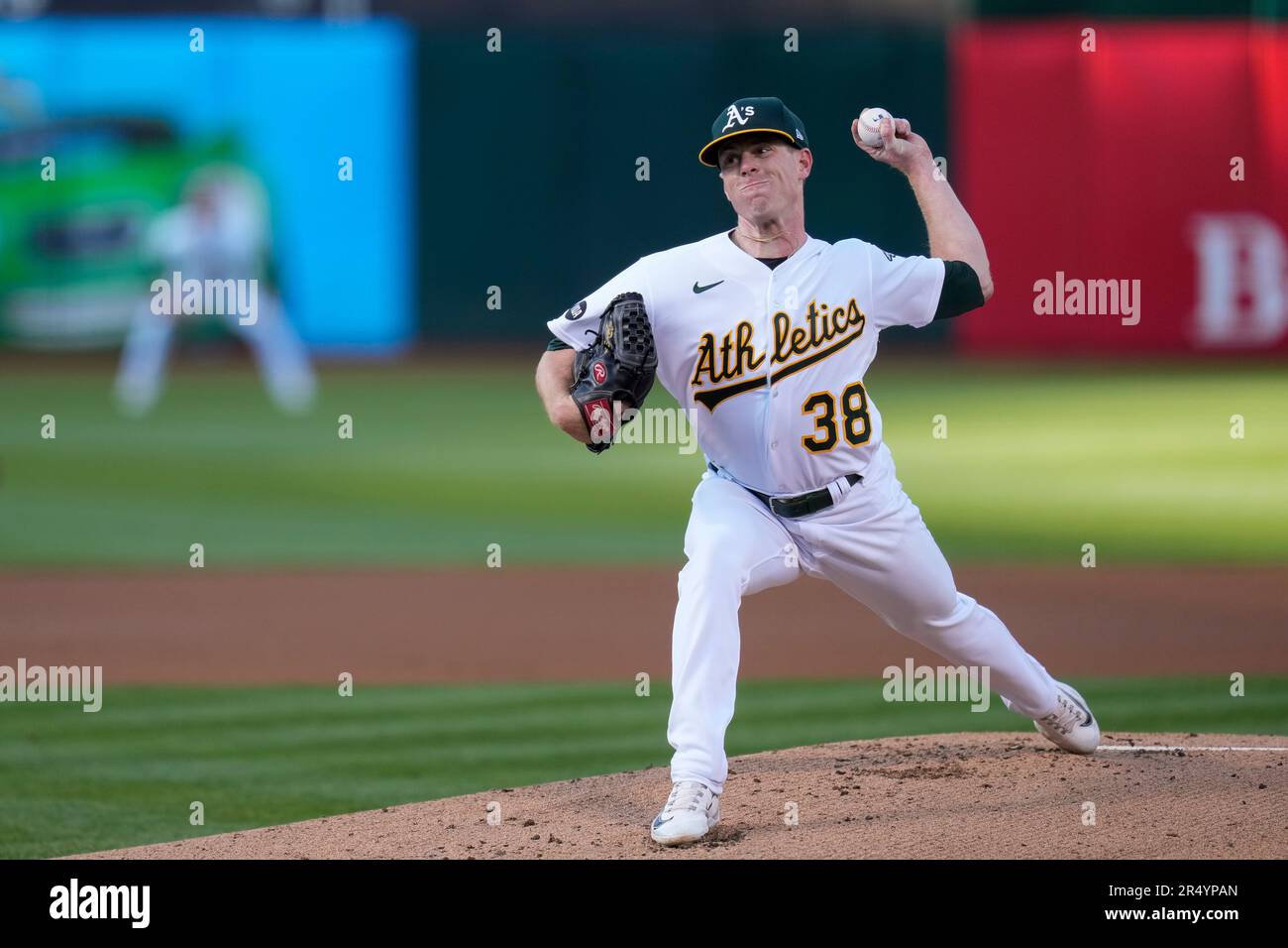 Oakland Athletics pitcher JP Sears throws to an Atlanta Braves batter ...