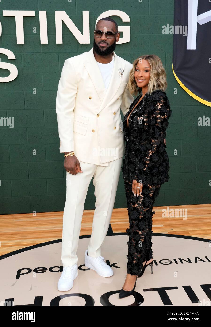 NBA basketball player LeBron James and his wife Savannah pose together at the premiere of the ...