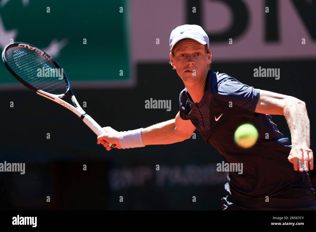 Italy's Jannik Sinner plays a shot against Germany's Daniel Altmaier ...