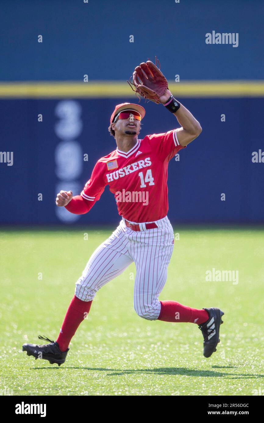 Nebraska Cornhuskers shortstop Brice Matthews (14) catches a fly ball ... Nebraska Cornhuskers shortstop Brice Matthews (14) catches a fly ball ...