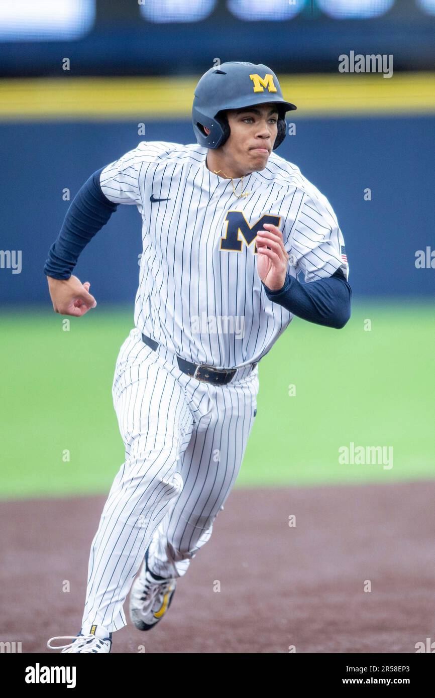 Michigan Wolverines third baseman Mitch Voit (55) runs to third base ...