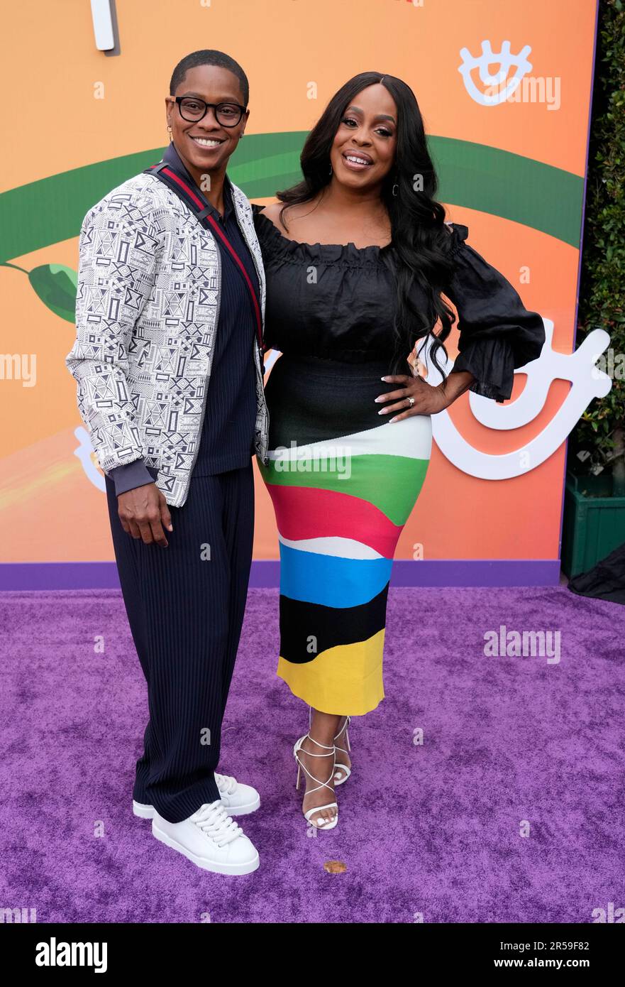 Niecy Nash-Betts, right, and her wife Jessica Betts pose together at ...