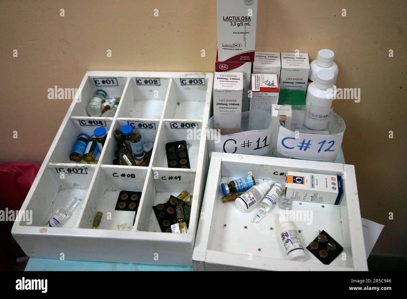 Medicine for dengue treatment sit on a tray inside a pavilion to treat ...