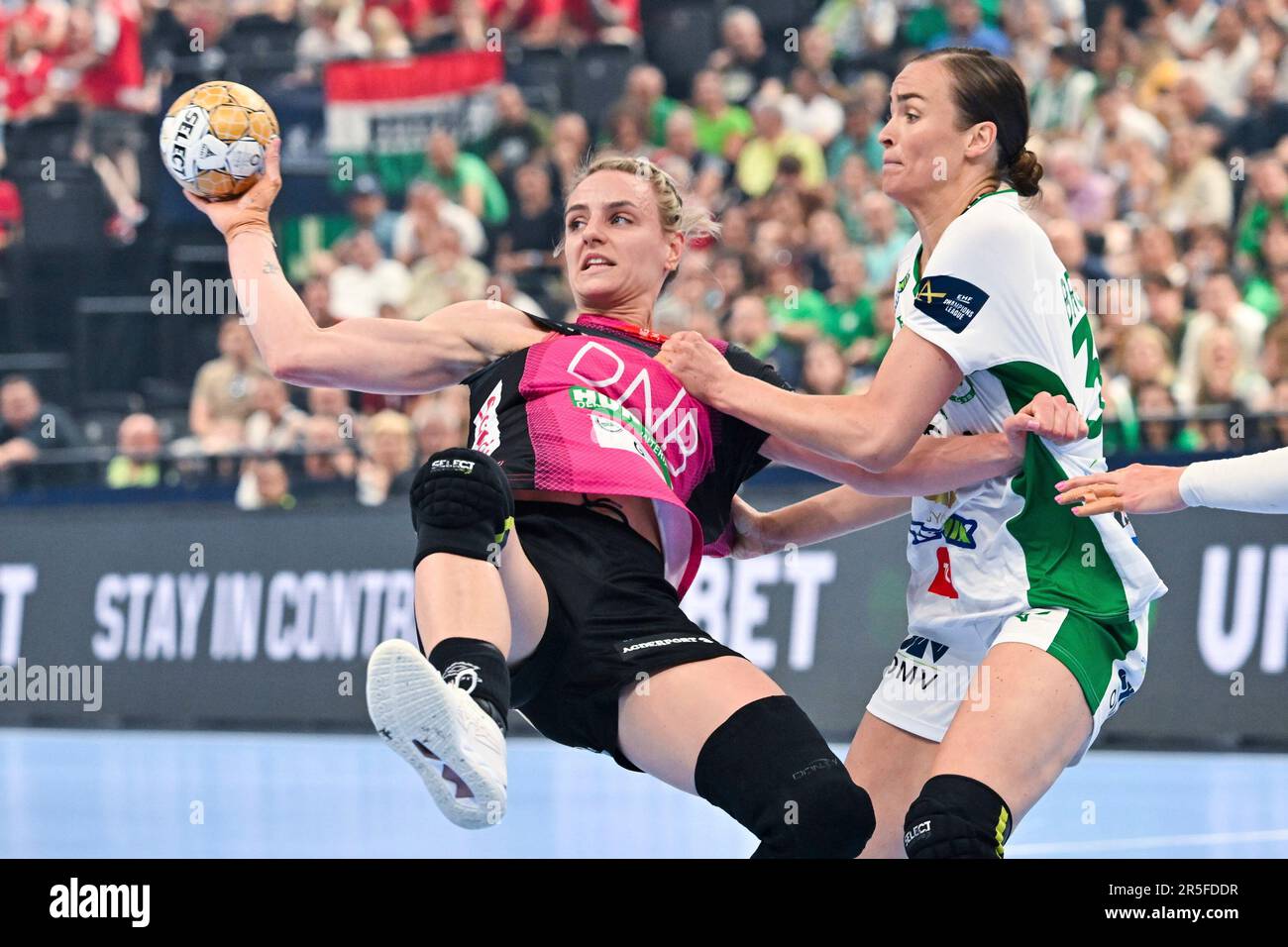 Marketa Jerabkova, left, of Vipers Kristiansand is challenged for the ball by Yvette Broch of ...