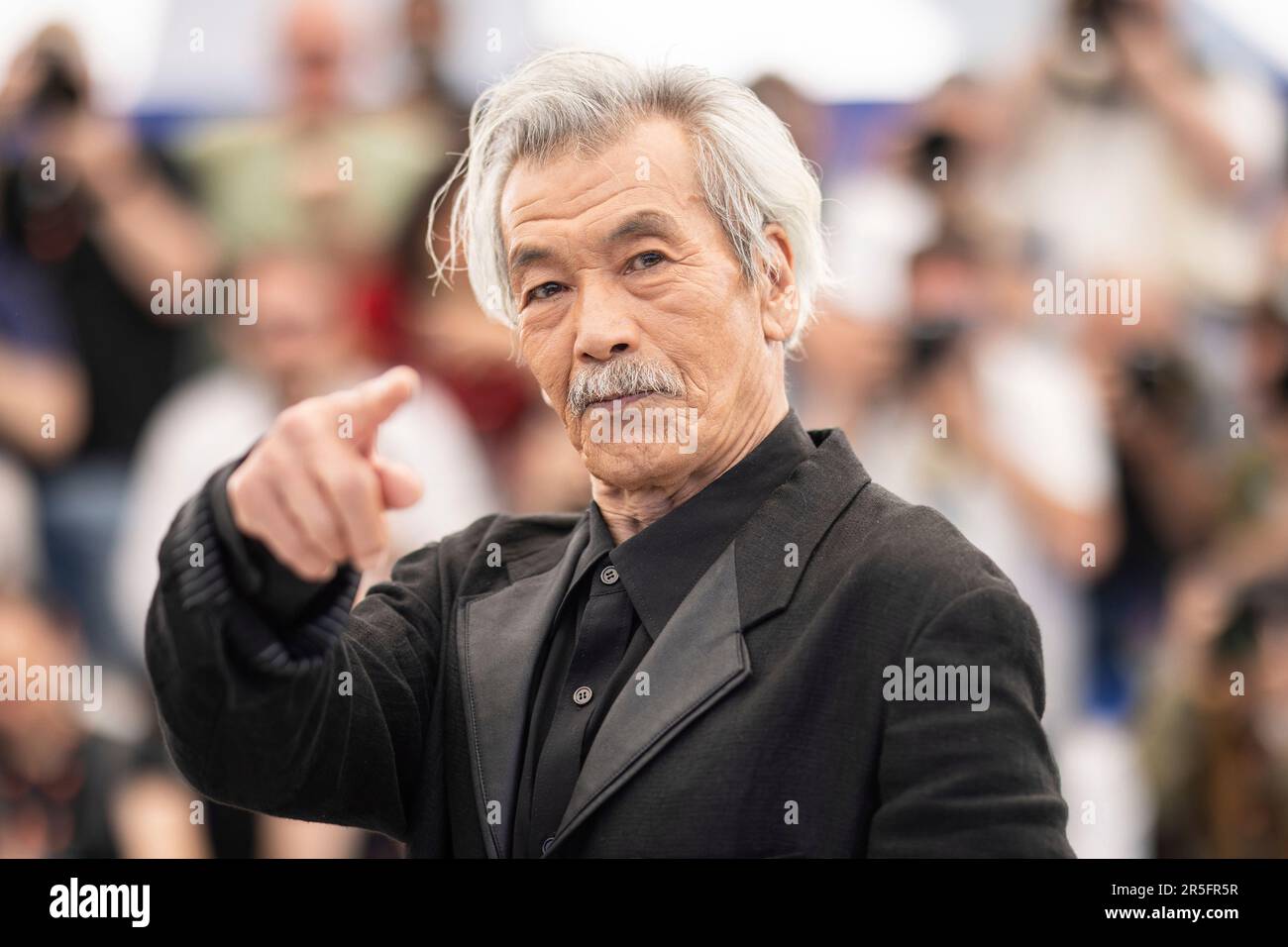 Min Tanaka poses for photographers at the photo call for the film ...