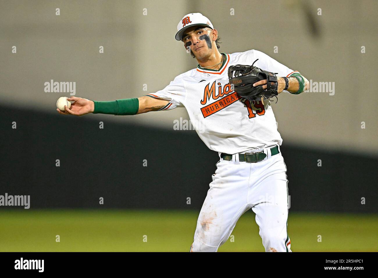 CORAL GABLES, FL - JUNE 03: Miami infielder Dominic Pitelli (19) throws ...