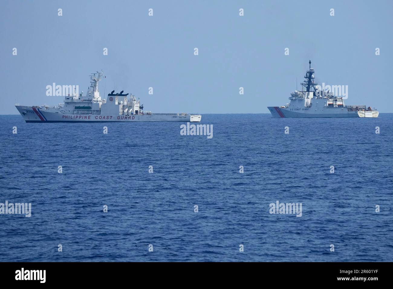 A U.S. Coast Guard Cutter Stratton (WMSL 752), right, beside Philippine ...