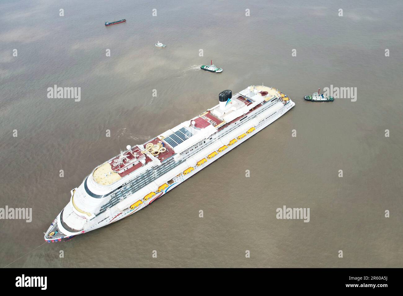 Adora Magic City, China's first home-grown large cruise liner, left its ...