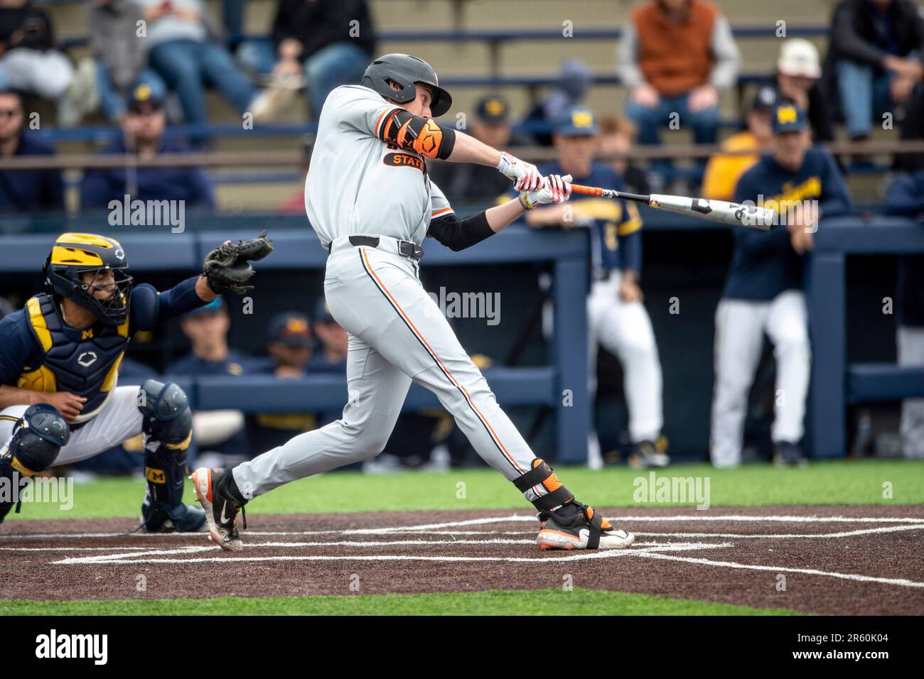 Oklahoma State Cowboys pinch hitter Colin Brueggemann (12) swings the ...