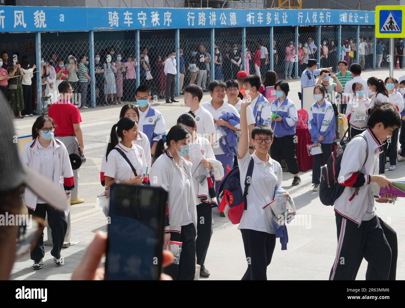 High school students form a long line to take the Chinese college ...