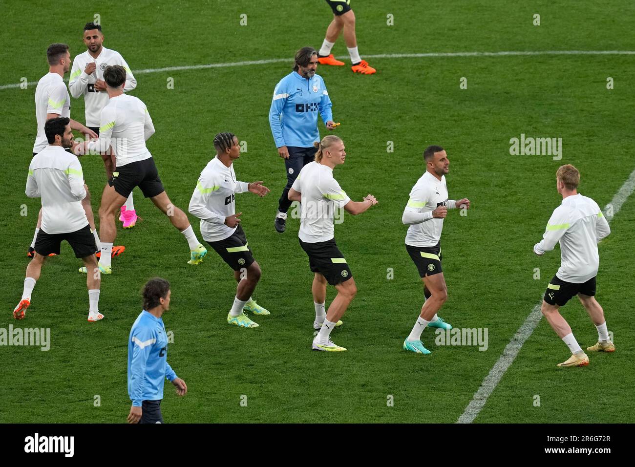 Manchester City players warm-up during a training session at the ...