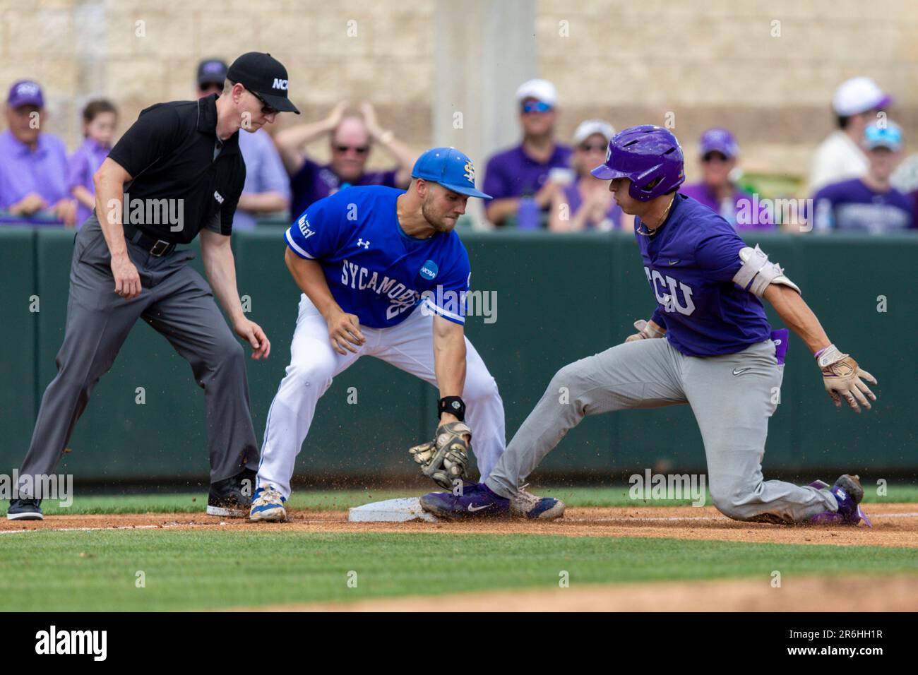 Indiana State infielder Mike Sears, second from left, is unable to tag ...