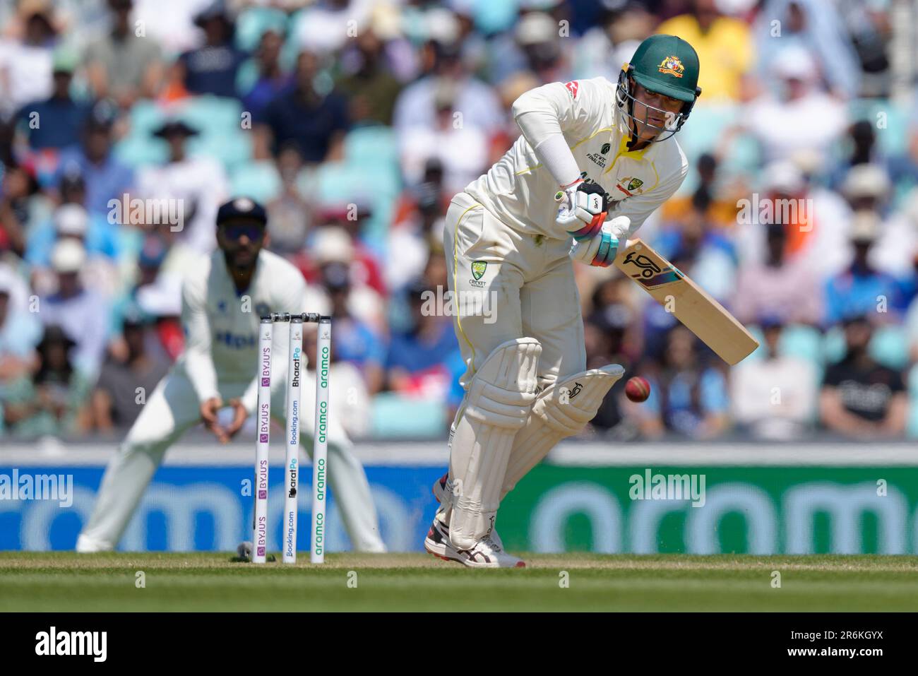 Australia's Alex Carey plays a shot off the bowling of India's Shardul Thakur on the fourth day ...