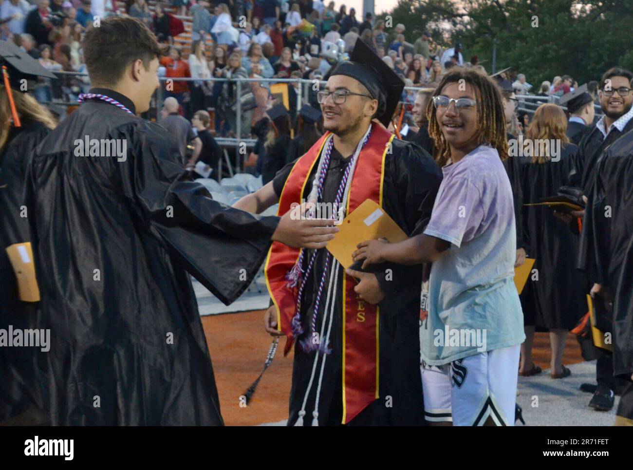 Graduates and friends embrace after the conclusion of La Porte High ...