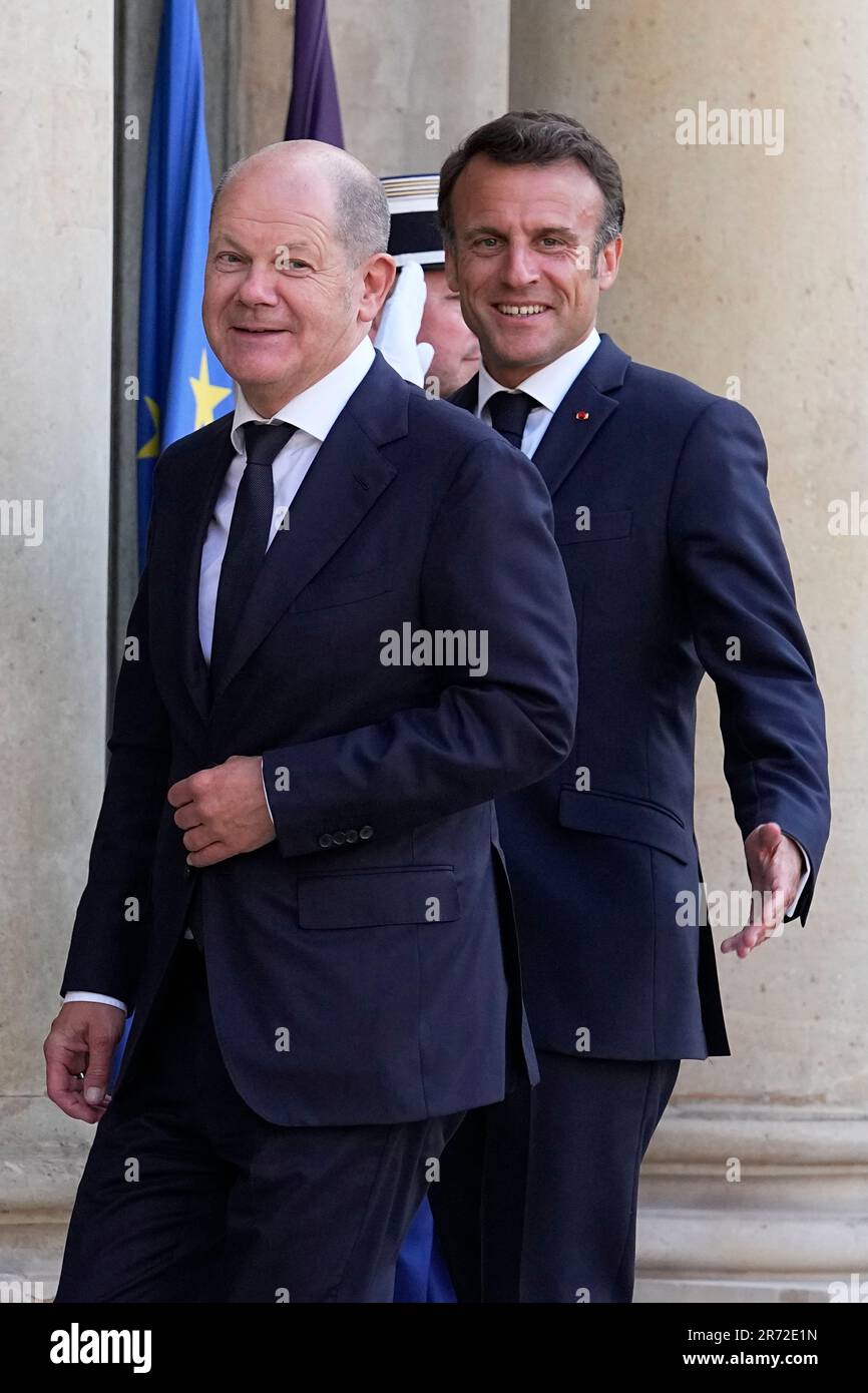 French President Emmanuel Macron, right, welcomes German Chancellor ...