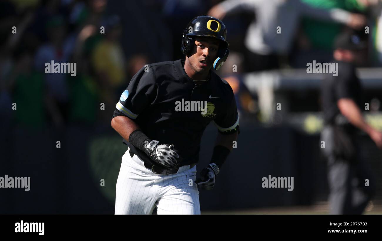 Oregon infielder Sabin Ceballos (21) runs to first base during an NCAA college baseball ...