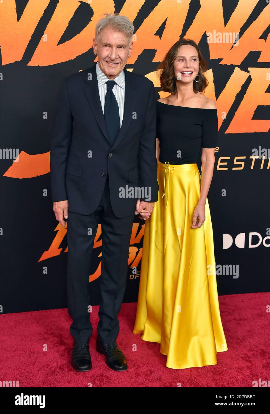 Harrison Ford, left, and Calista Flockhart arrive at the premiere of ...