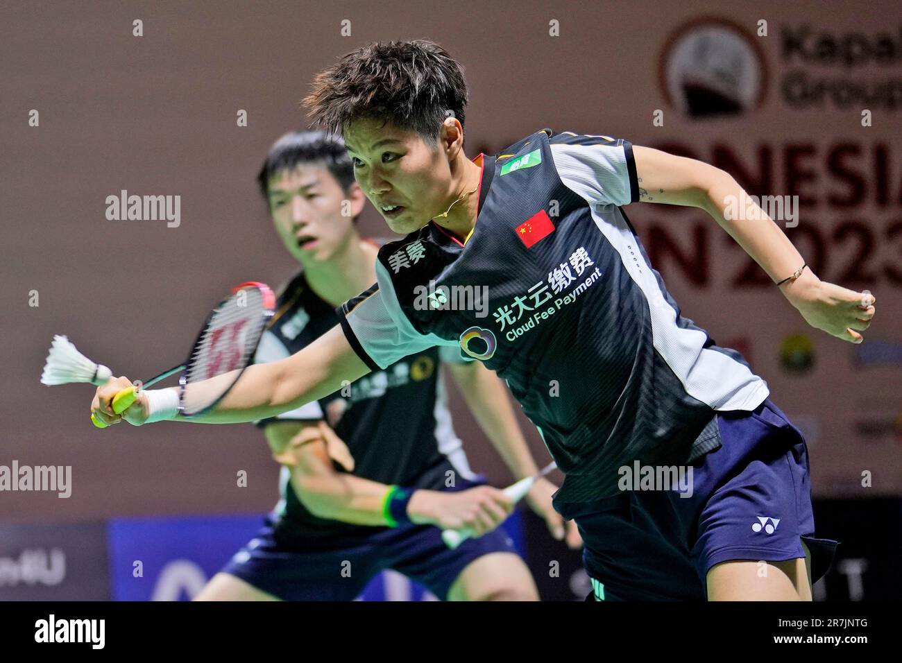 China's Feng Yan Zhe and Huang Dong Ping, right, play against Thailand ...