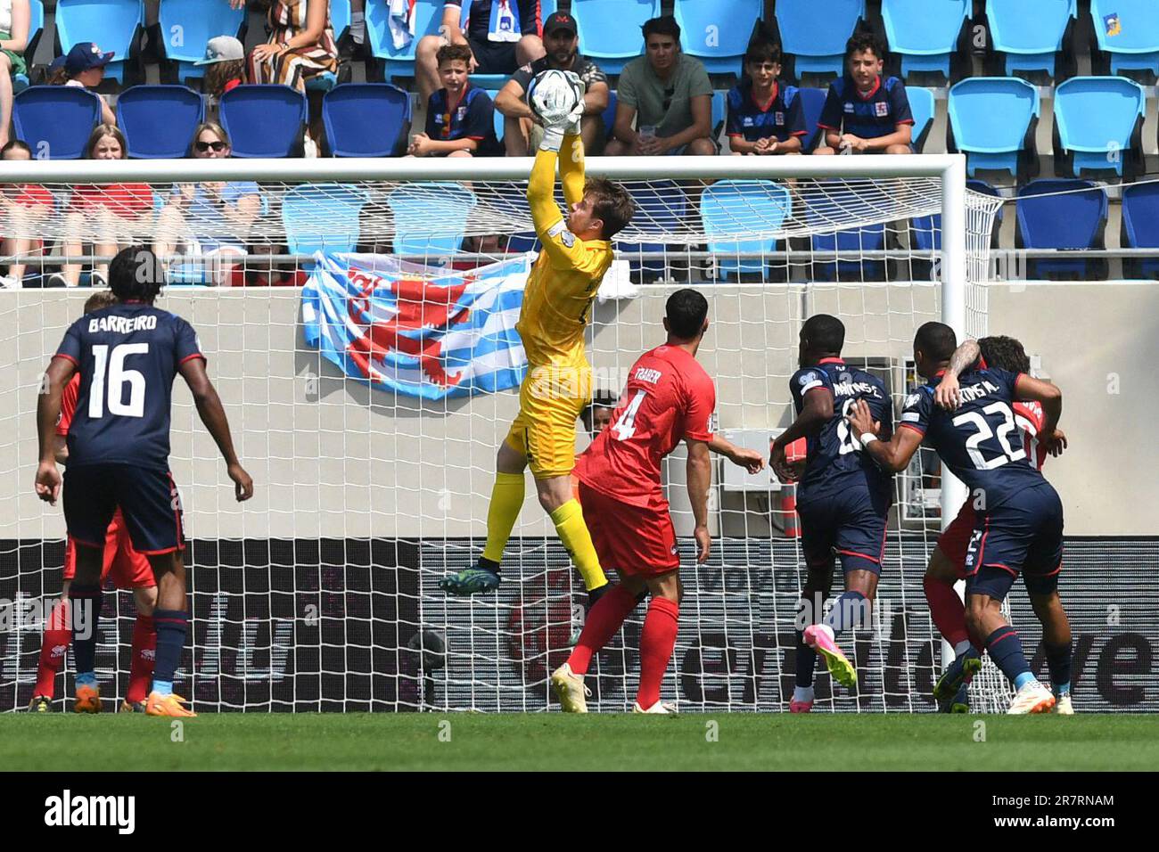 Liechtenstein's goalkeeper Benjamin Buchel goes up for a save during ...
