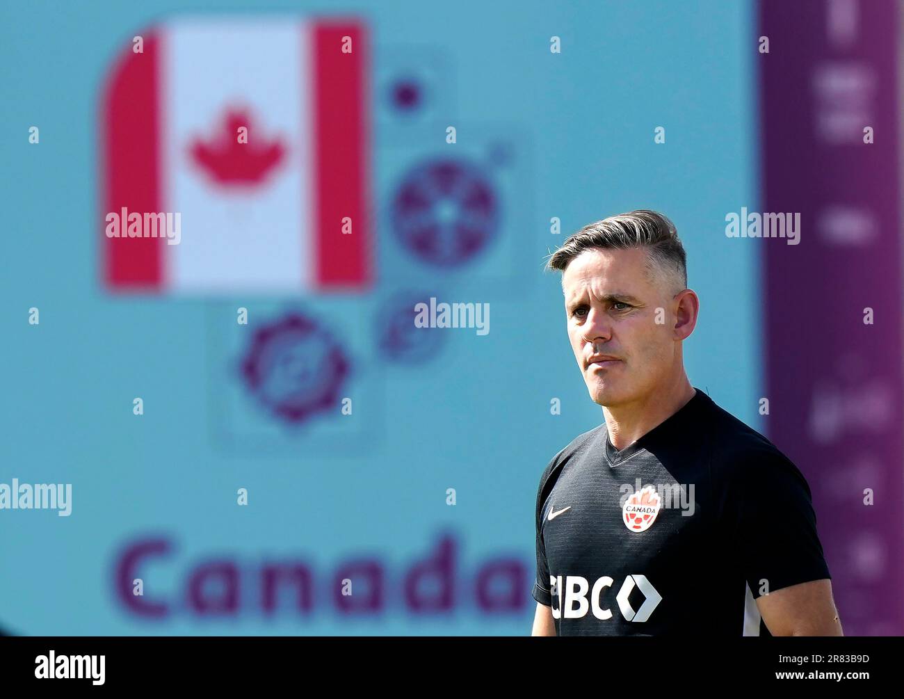 FILE- Canada head coach John Herdman watches his team during practice at the World Cup soccer ...