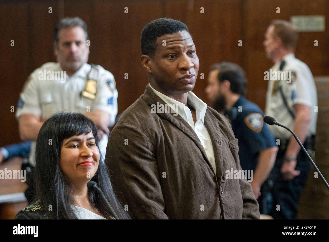 Jonathan Majors stands in court during a hearing in his domestic ...