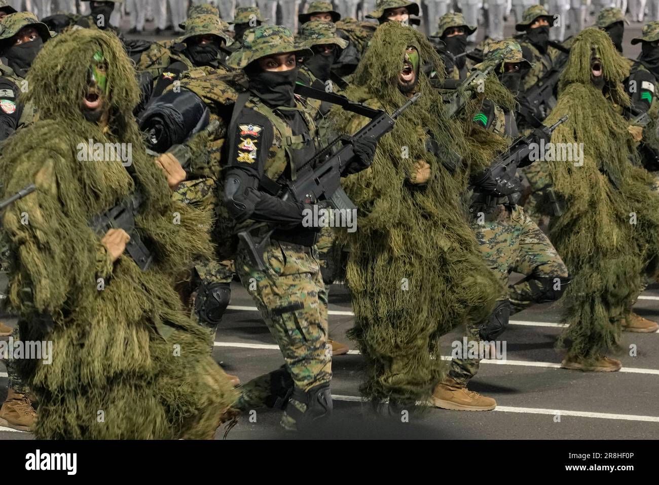 Members of the Saudi special forces for Hajj and Umrah (SFHU), perform ...