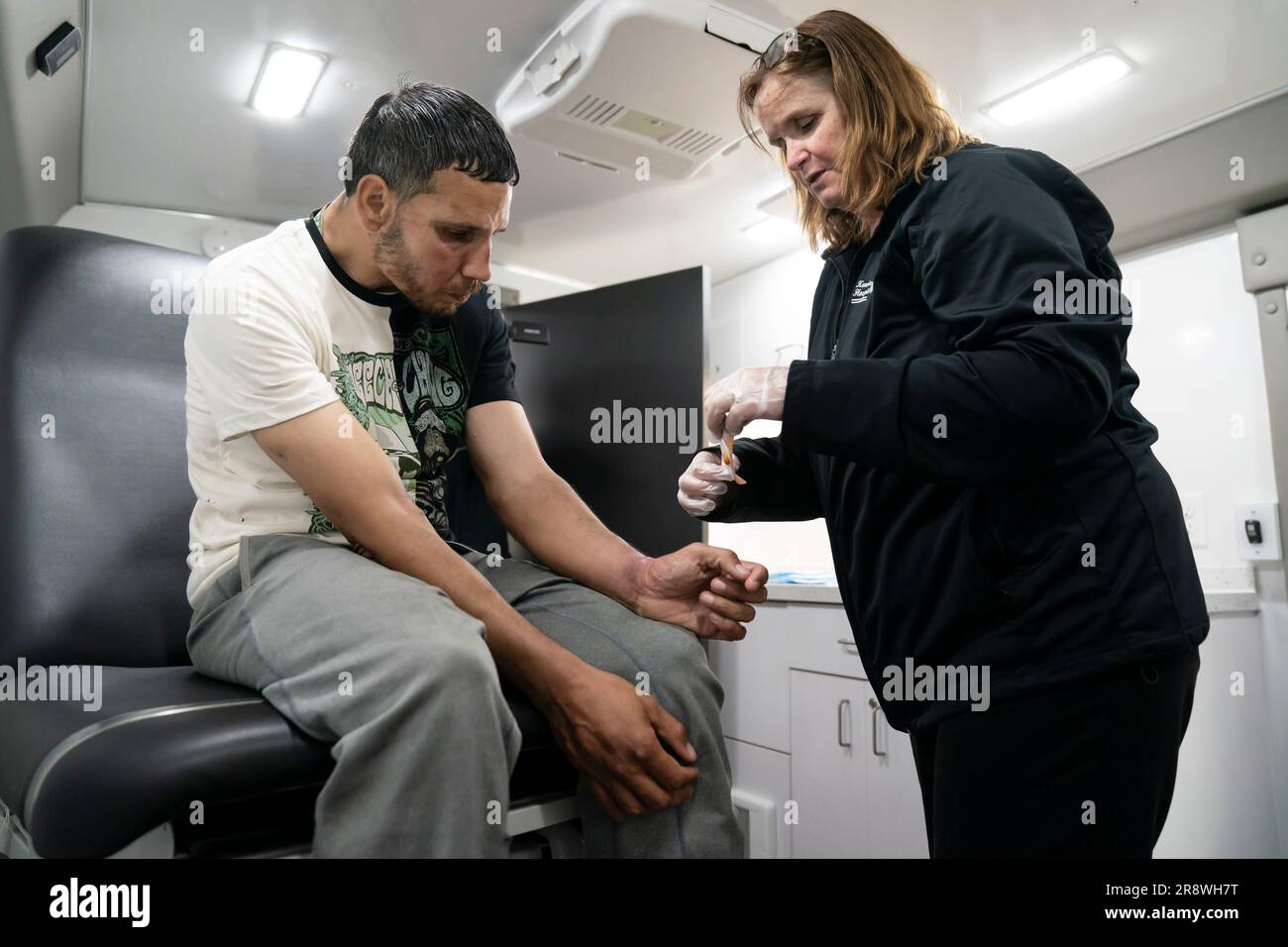 Registered nurse Kathy Lalli treats Dominic Rodriguez skin injury at ...