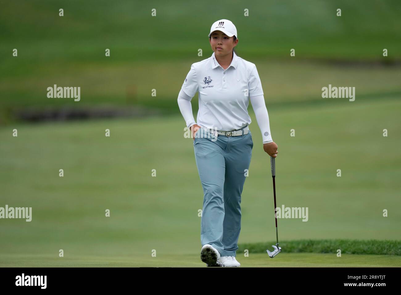 Ruoning Yin, of China, reacts to a missed putt on the third hole during ...