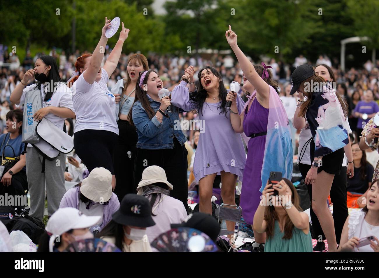 Fans of BTS gather during an event to celebrate the 10th debut ...
