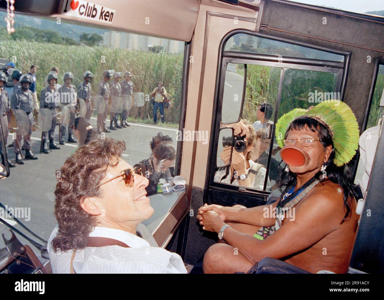 Kayapo tribe chief Raoni, right, waits in a bus carrying indigenous ...