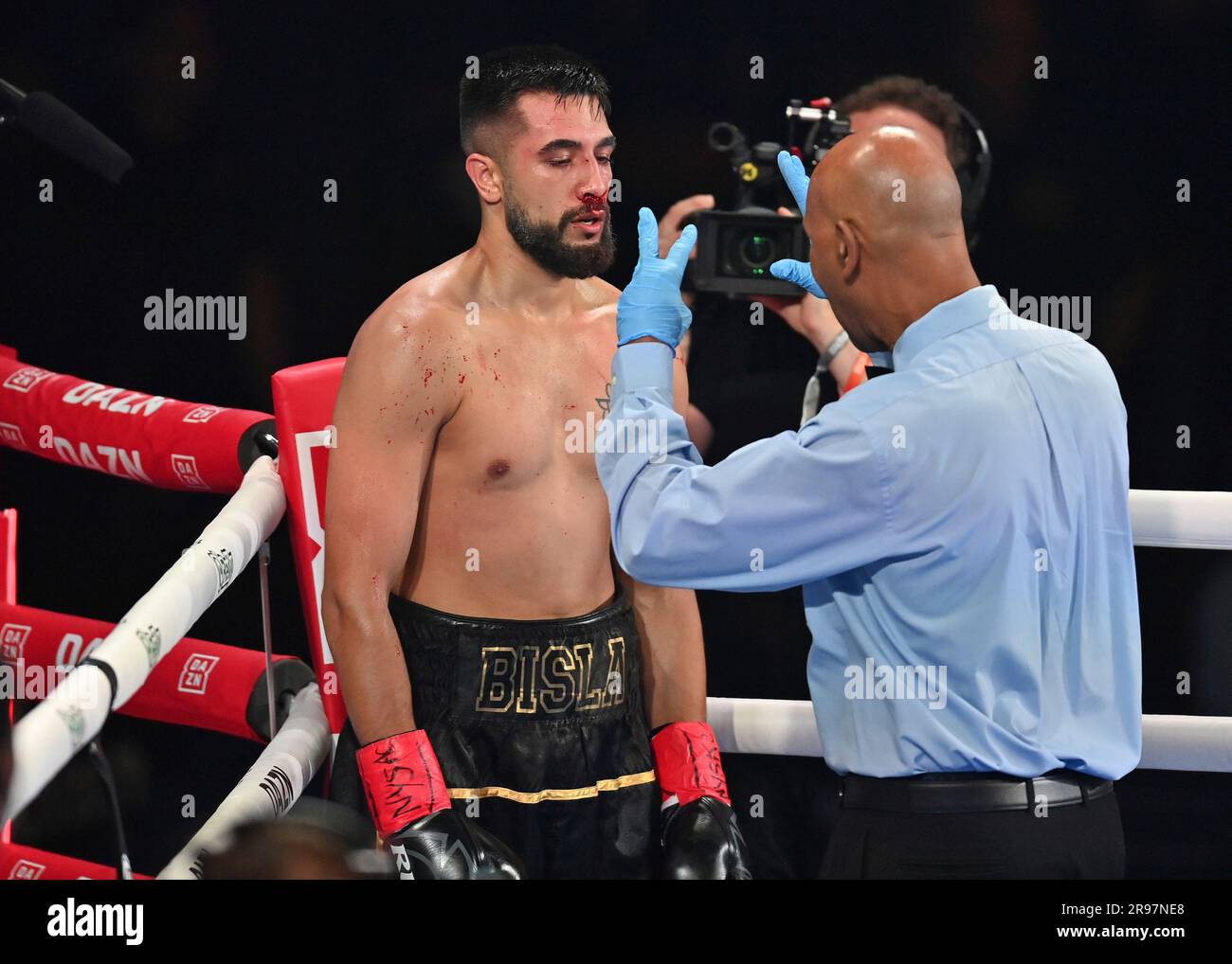 NEW YORK, NY - JUN 24: Khalil Coe (blue tape) takes on Buneet Bisla ...