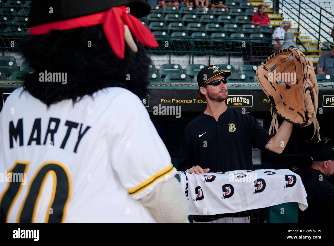 Bradenton Marauders pitcher Derek Diamond (26) with mascot Marty's ...