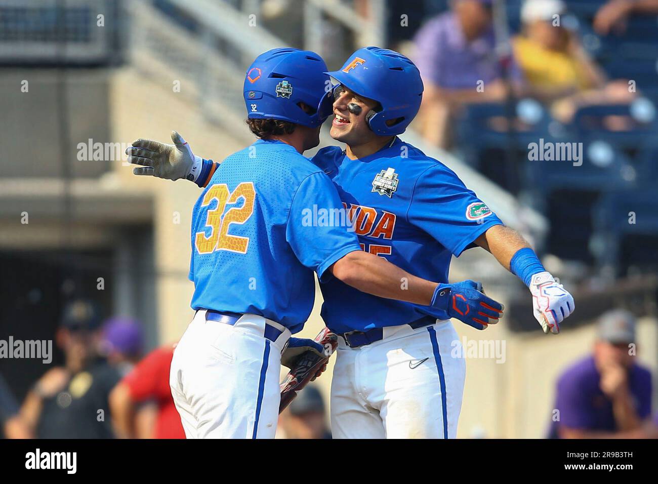 Florida's BT Riopelle is greeted by Tucker Talbott (32) after hitting a ...