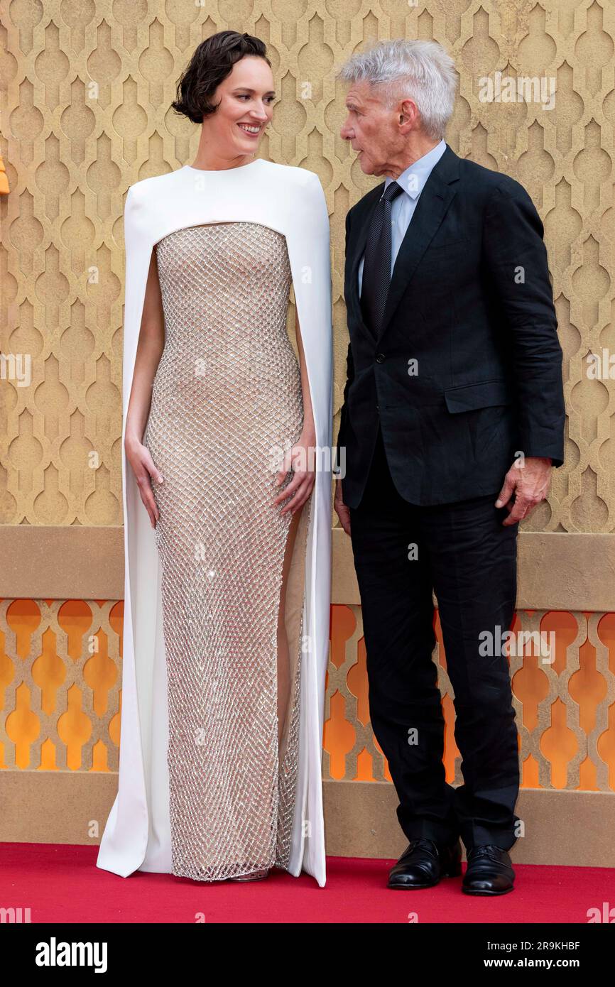 Phoebe Waller-Bridge, left, and Harrison Ford, pose for photographers ...