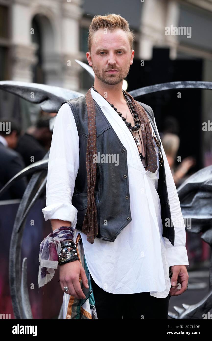 Tom Canton poses for photographers upon arrival at the World premiere ...