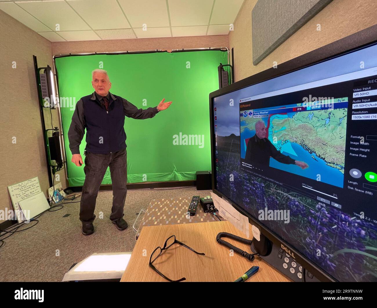 In this June 21, 2023, photo, meteorologist David Percy films the daily ...