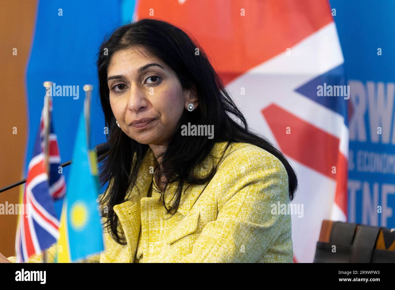 FILE - Britain's Home Secretary Suella Braverman pauses, during a press conference in the ...