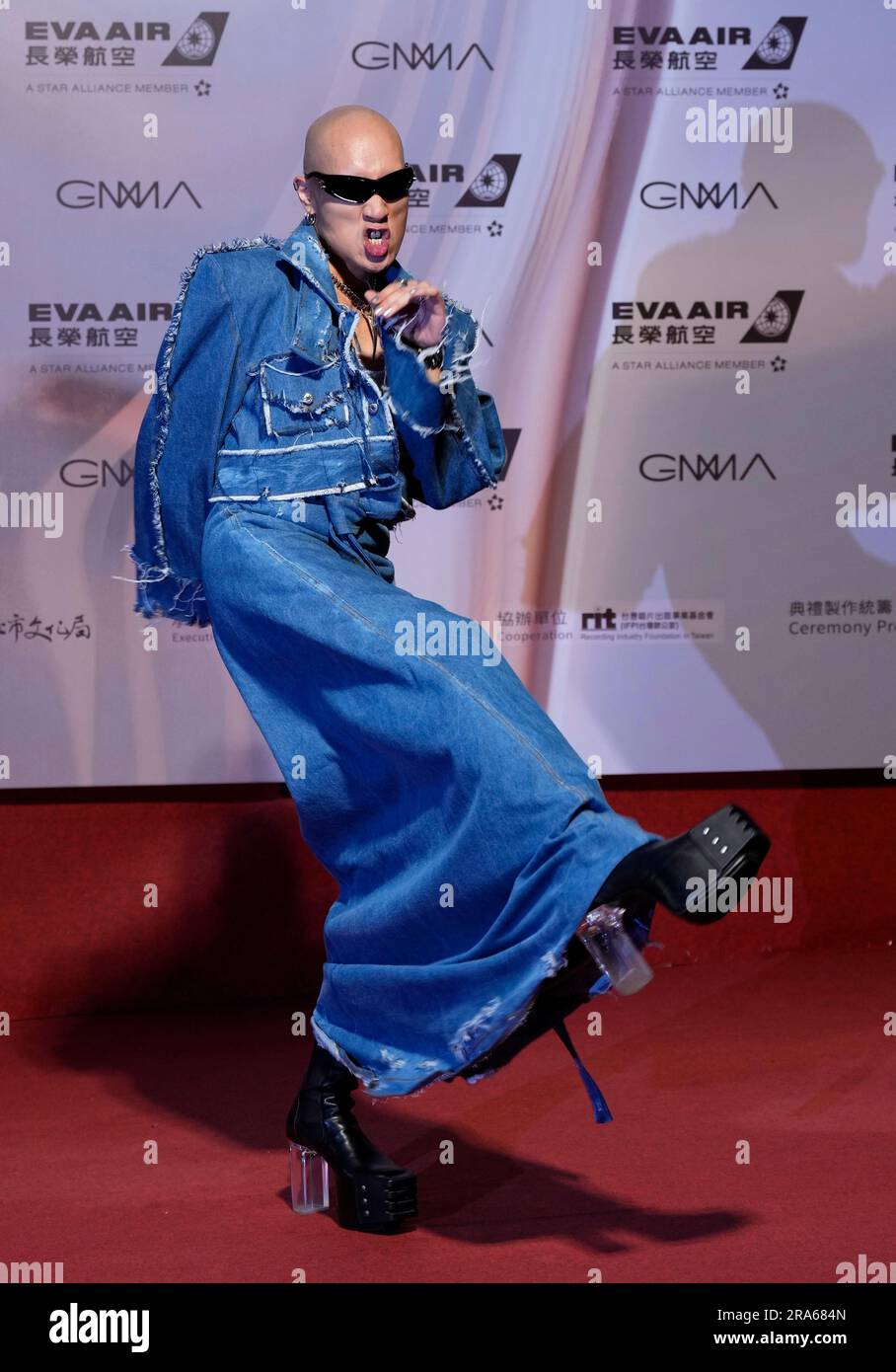 Taiwanese singer Yellow poses for a photo as he arrive for the 34th ...
