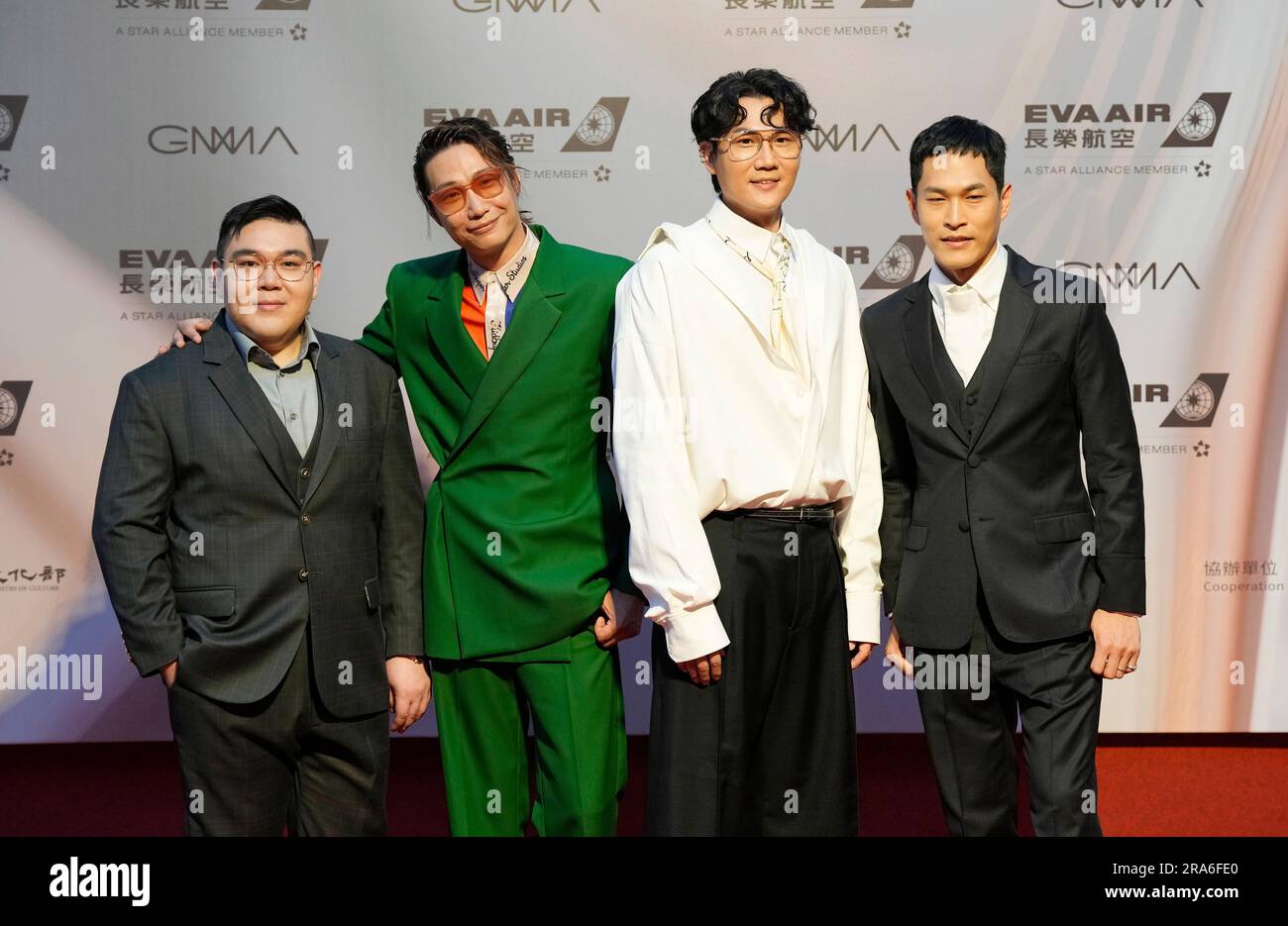 Taiwanese pop group Cosmos People pose for a photo as they arrive for ...