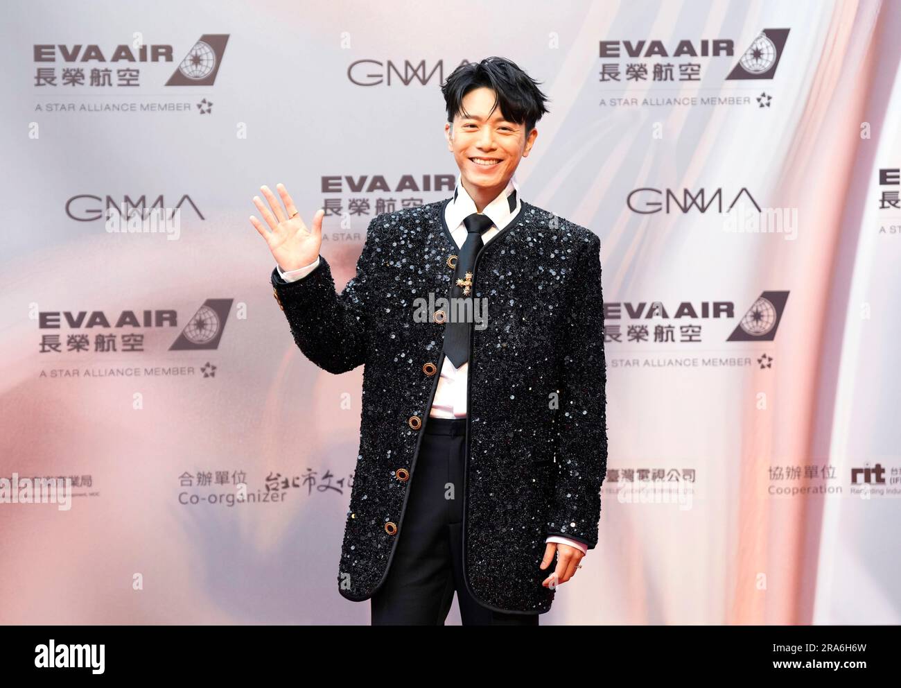 Taiwanese singer William Wei poses for a photo as he arrives for the ...