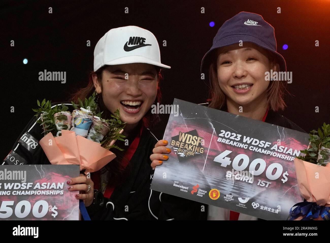 From left, silver medalist Japan's Ami and gold medalist Japan's Ayumi ...