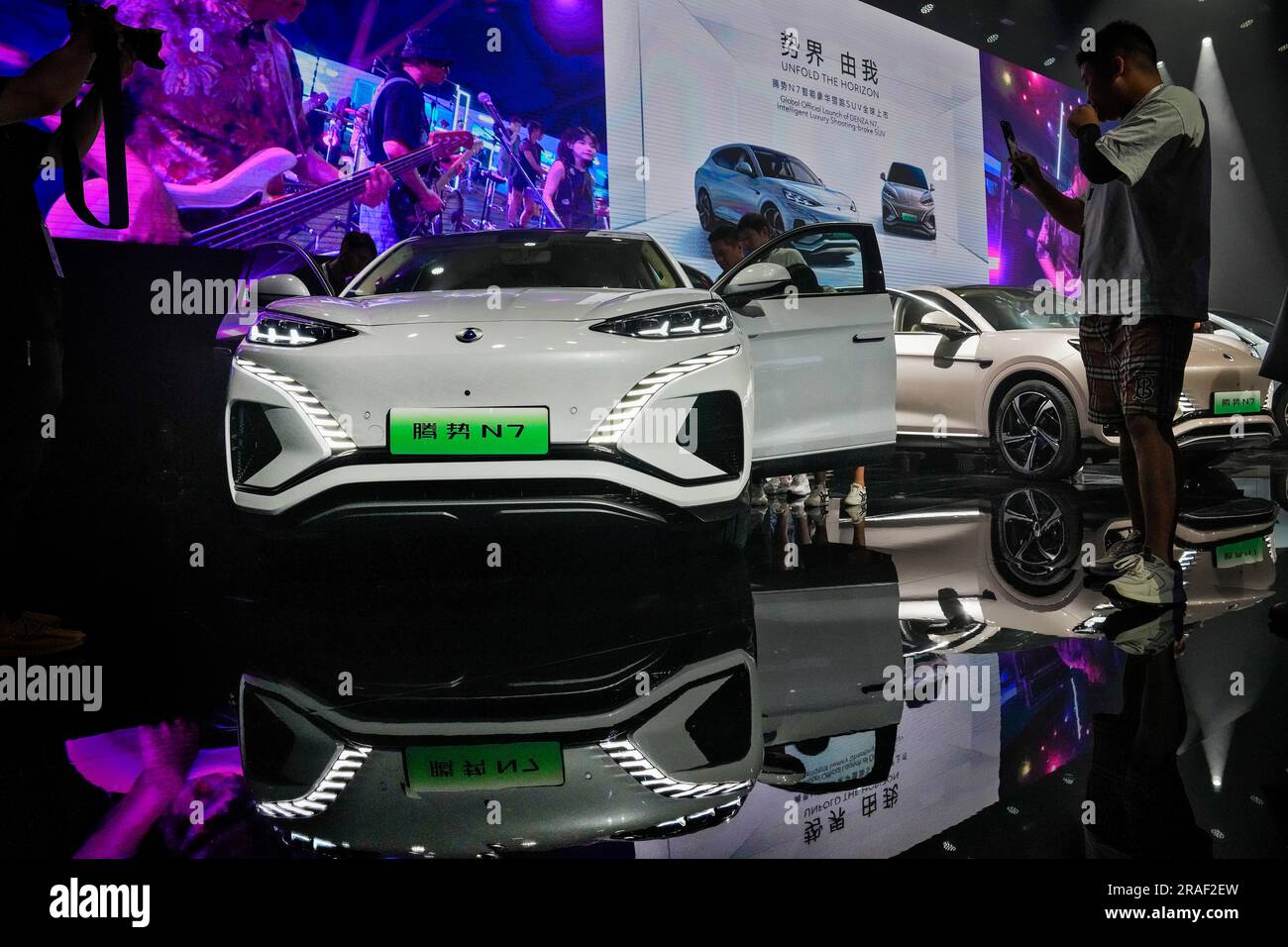 Invited guests look at the Denza N7, a new electric SUV model by ...