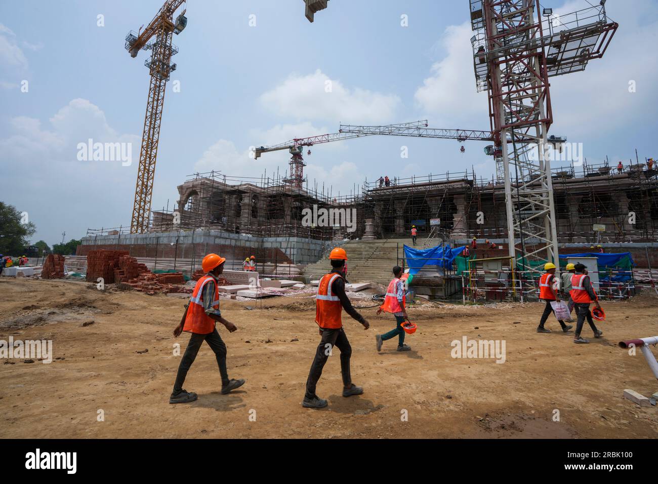 Workers are engaged in the construction of a temple of Hindu god Ram ...