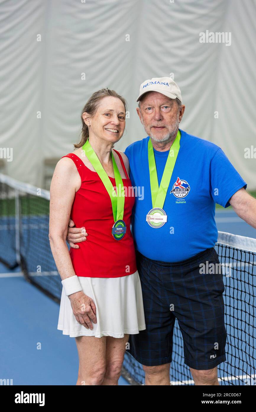 IMAGE DISTRIBUTED FOR HUMANA INC. Husband and wife tennis players David ...