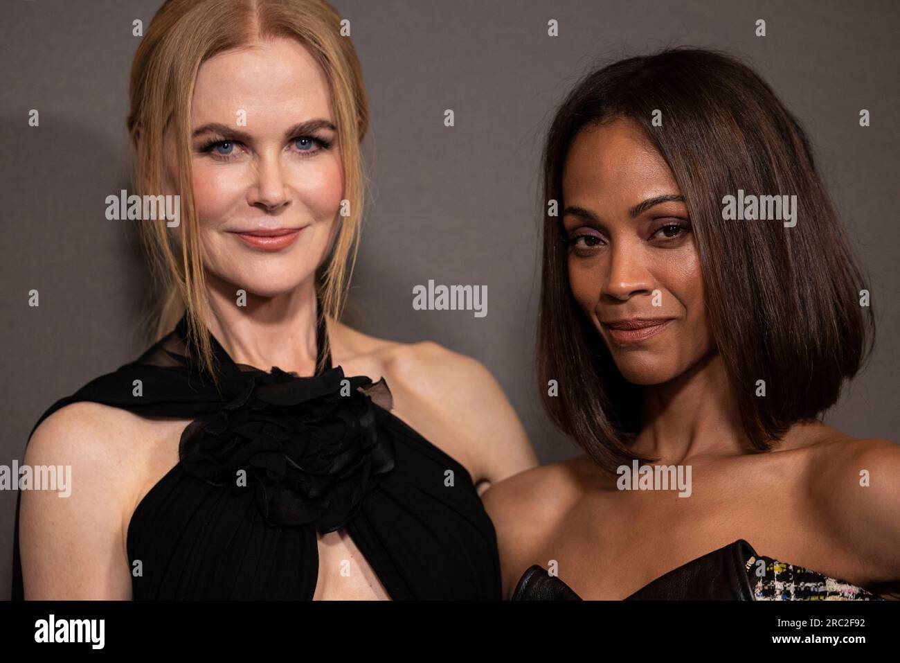 Nicole Kidman, left, and Zoe Saldana pose for photographers upon ...
