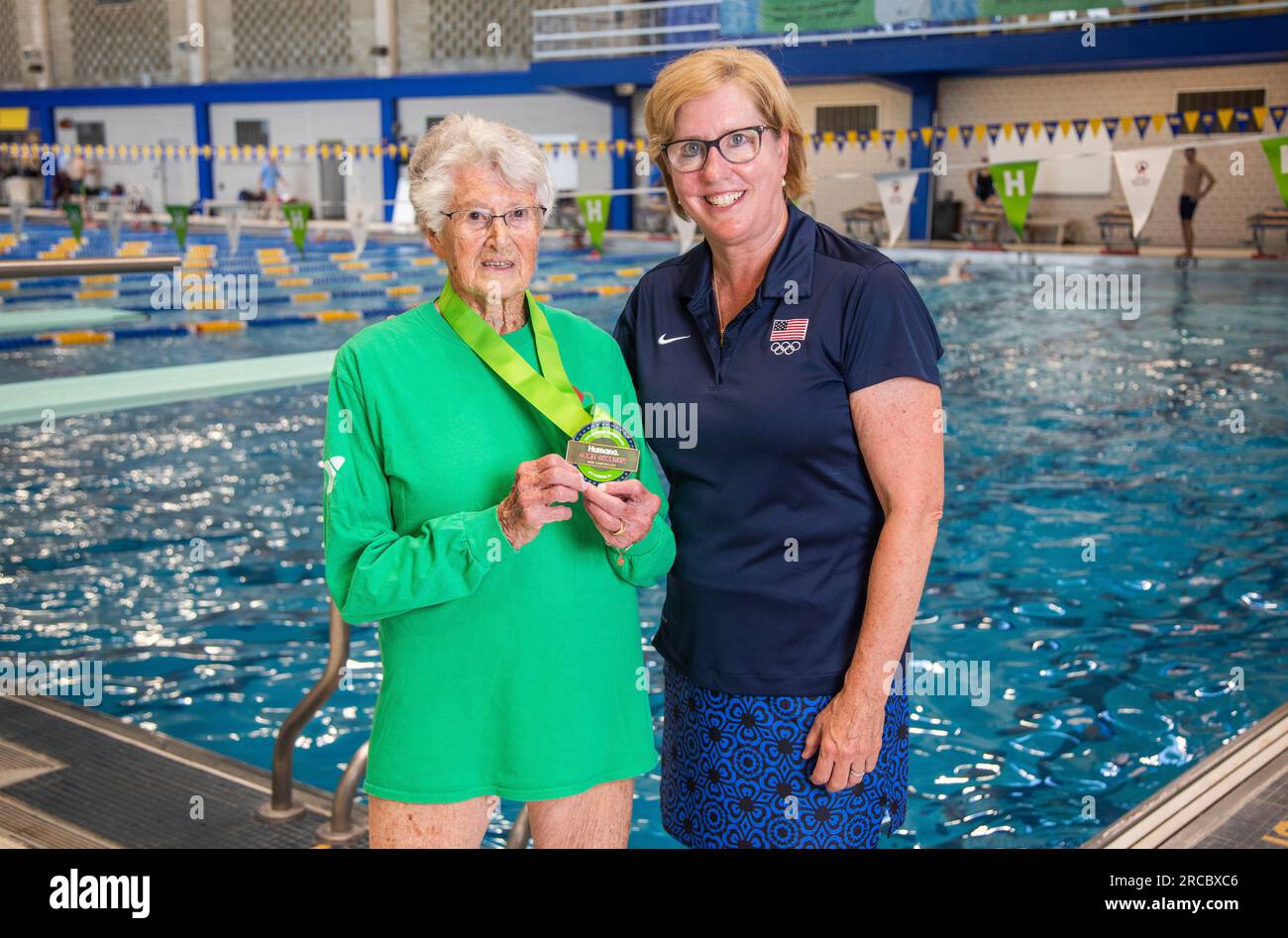 IMAGE DISTRIBUTED FOR HUMANA INC. - Swimmer Judy Young, 97, accepts a ...
