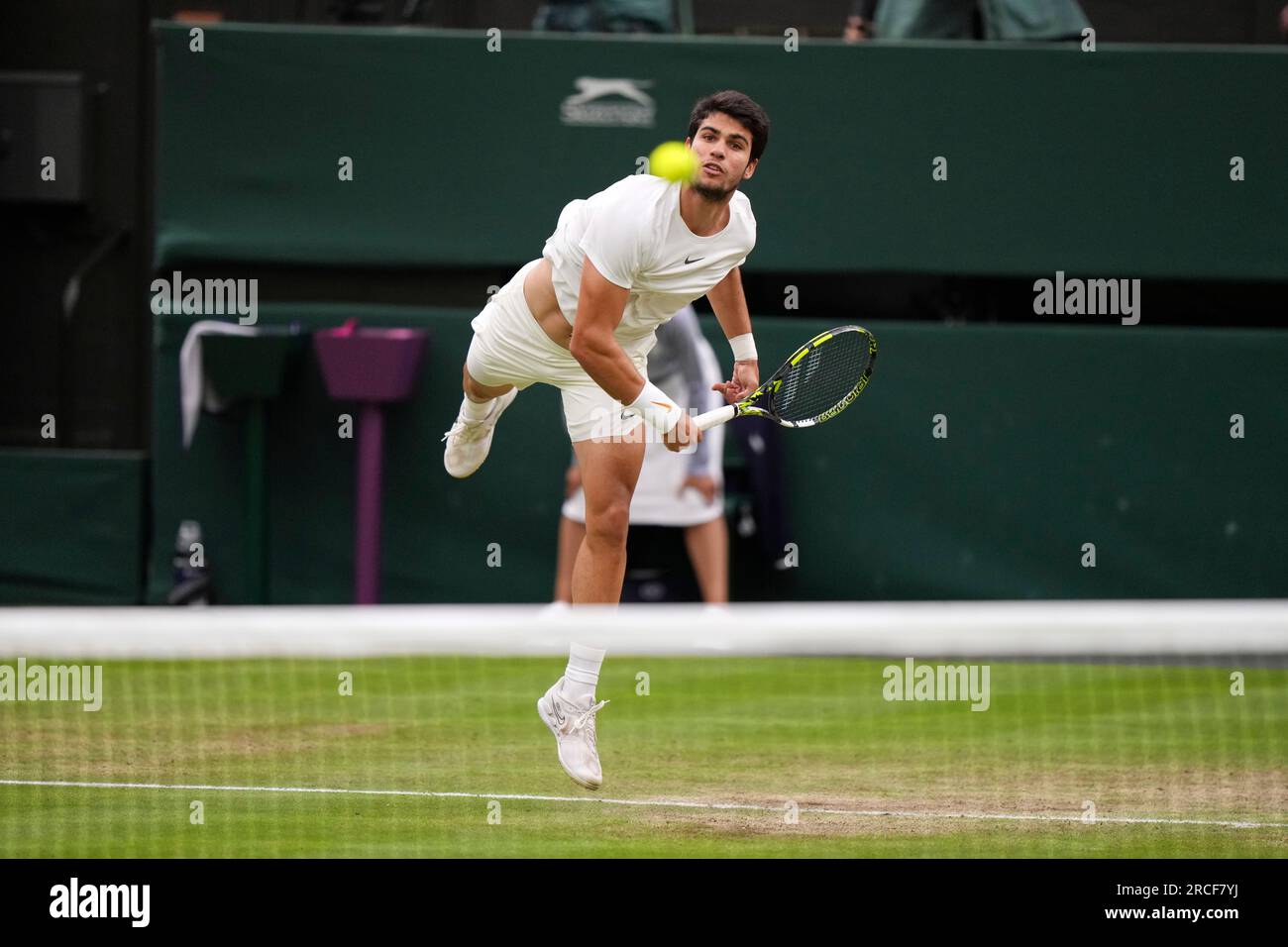Spain's Carlos Alcaraz in action against Russia's Daniil Medvedev ...