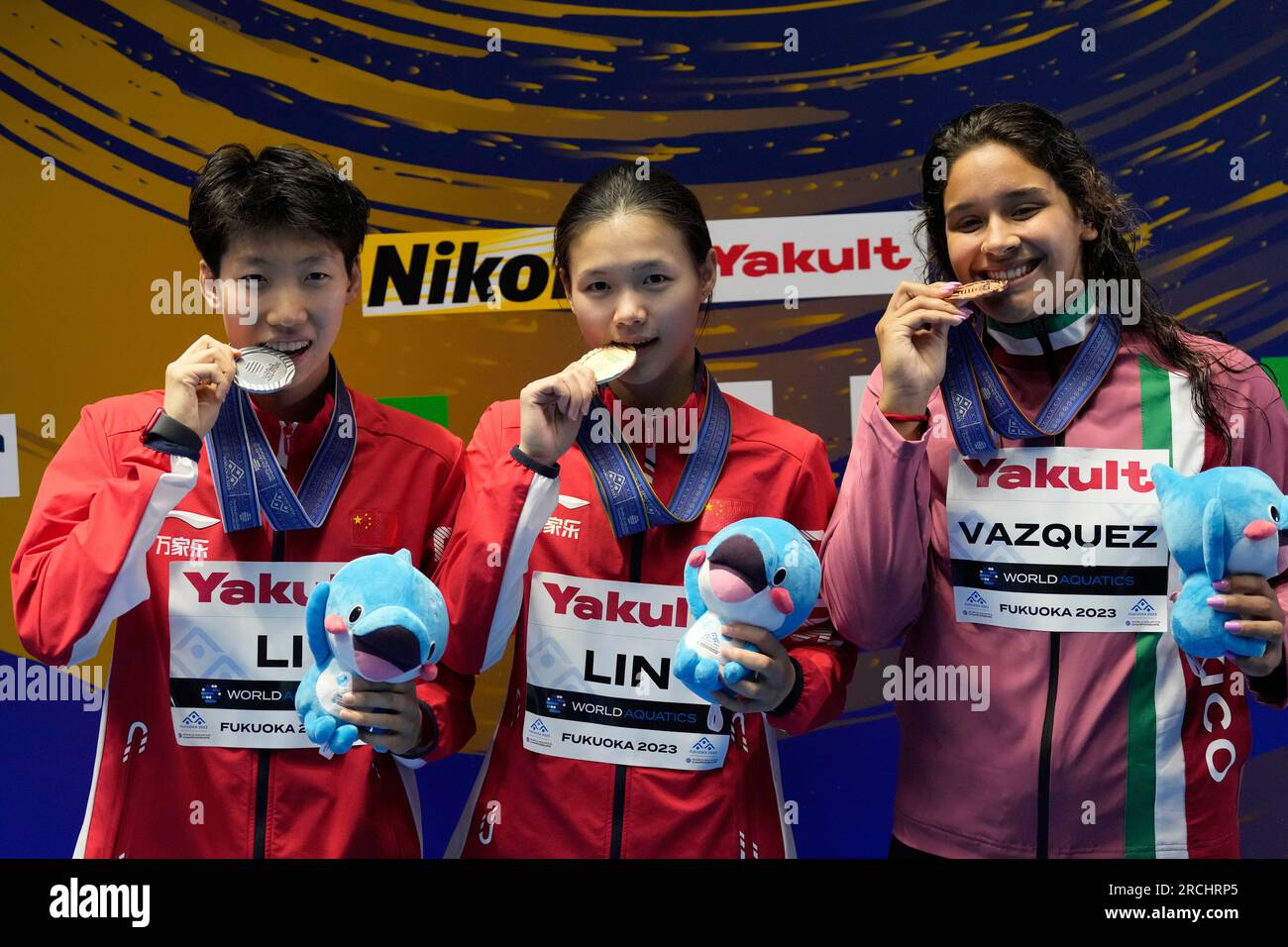 From left to right, silver medalist Li Yajie of China, gold medalist ...