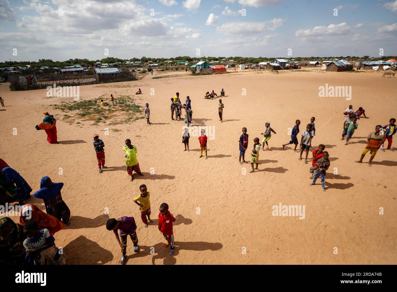 Somali refugee children play outside in an open field at Dadaab refugee ...